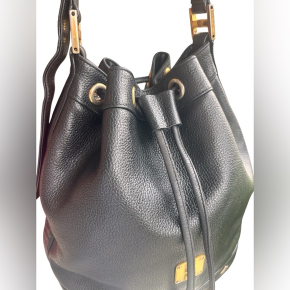 MCM | Bags | Mcm Black Leather Drawstring Bucket Bag Visetos Logo Gold ...